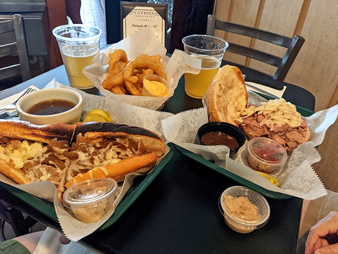 Cold beer, hot sandwiches, and fries that deserve their own fan club. This is what happiness looks like on a tray.