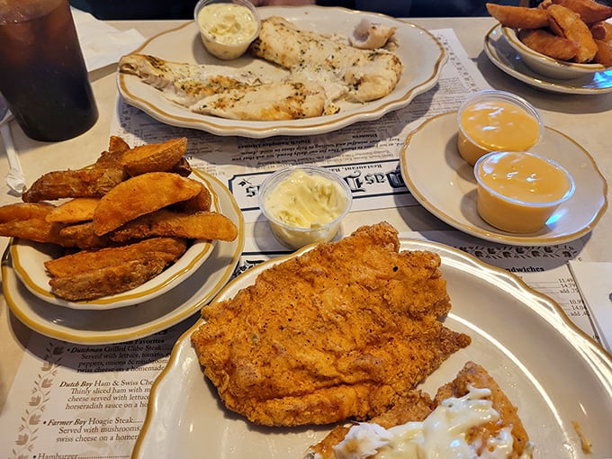 Golden-fried perfection meets homestyle sides—a plate that says "diet starts tomorrow" in the most convincing way possible.