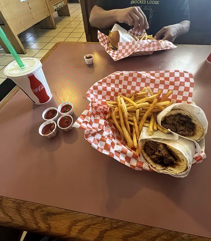 The universal language of good food, spoken fluently with wraps, fries, and enough sauce cups to satisfy even the most dedicated dipper.