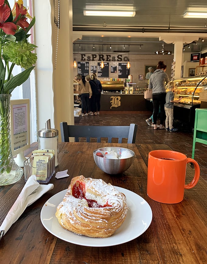 A Danish pastry moment of zen – that first bite with coffee while the world outside fades away like yesterday's worries.