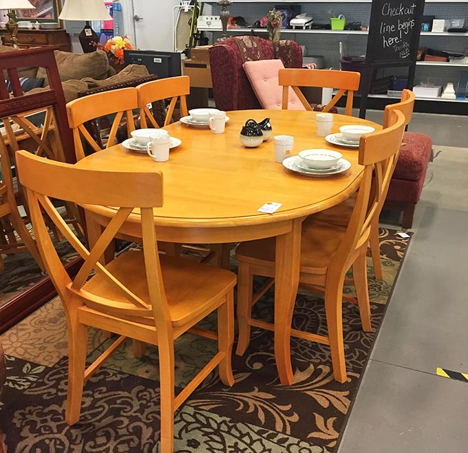 This honey-toned dining set isn't just furniture—it's future family dinners waiting to happen. Those chairs have already witnessed thousands of conversations; they're ready for yours.