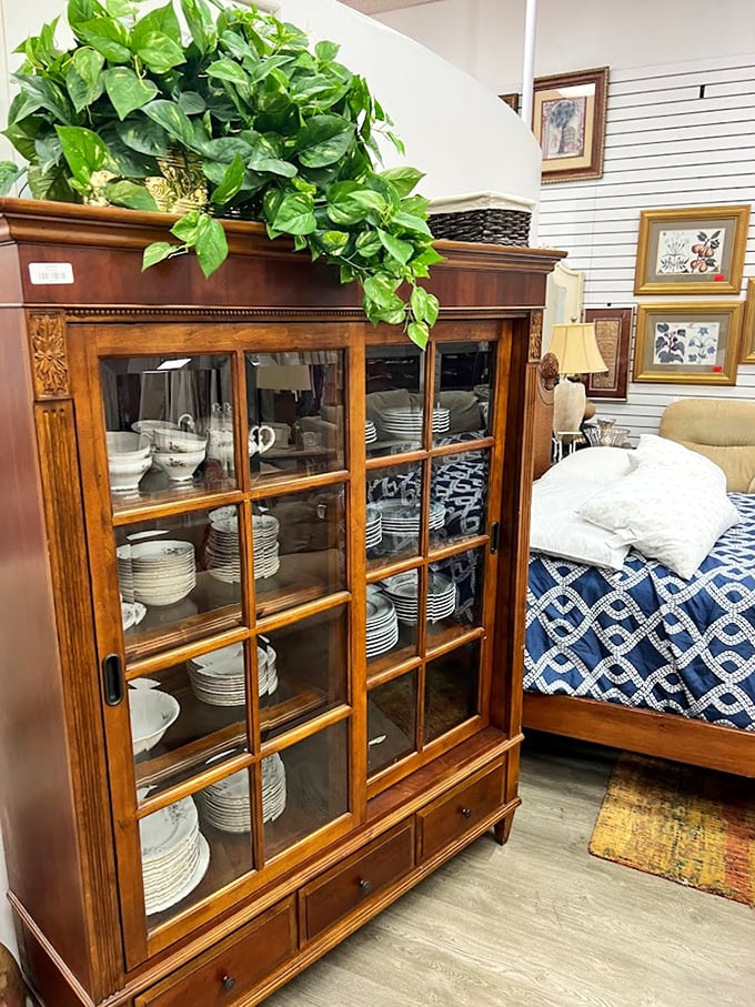 This handcrafted wooden cabinet with sliding glass doors isn't just furniture; it's a storyteller waiting for its next chapter.