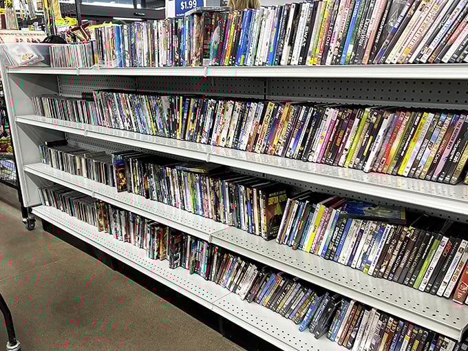 The DVD section—a nostalgic time capsule of entertainment before streaming, where physical media still reigns supreme for movie night enthusiasts.