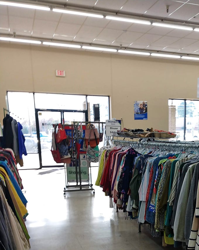 Neatly organized racks of colorful clothing await treasure hunters in North Little Rock's Goodwill, where fashion finds hide in plain sight.