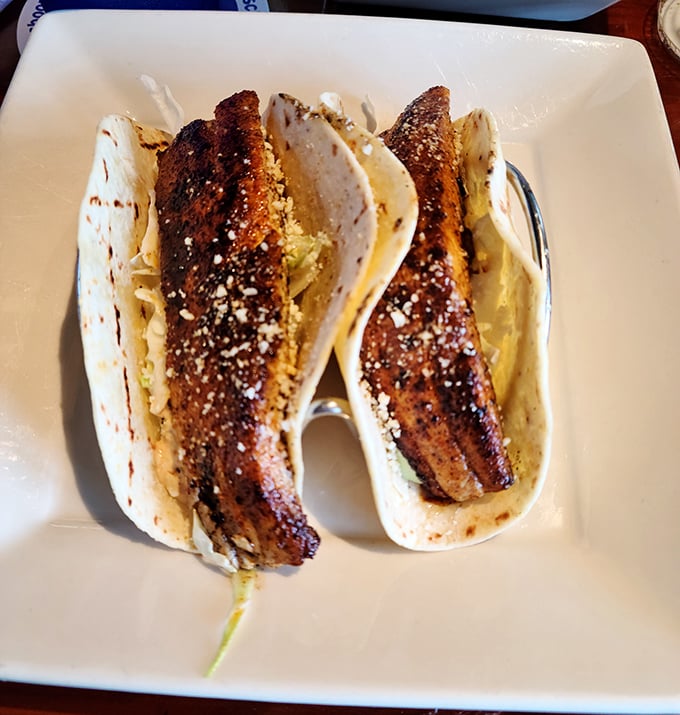 Now that’s what we call a catch! Perfectly blackened fish tucked into warm tortillas with a whisper of zest.