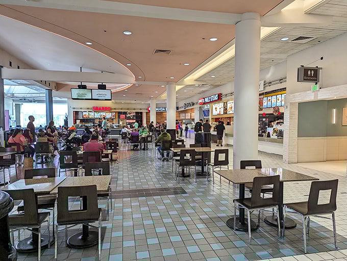The food court—retail's version of a watering hole where shoppers refuel, strategize their next moves, and justify that impulse purchase from earlier.