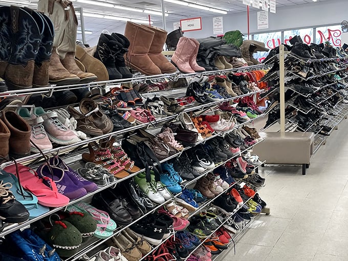 The footwear section—a United Nations of shoes where cowboy boots debate fashion points with sneakers and sensible flats.