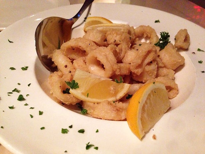 Perfectly golden calamari that shatters with each bite—the kind that converts even the most skeptical "I don't eat things with tentacles" people.