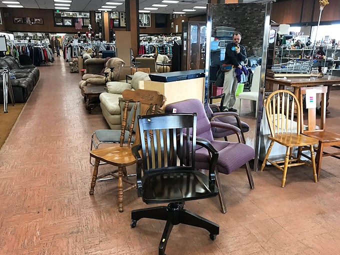 A furniture forest where vintage chairs and tables wait patiently for their "Cinderella moment" – from castoff to centerpiece.