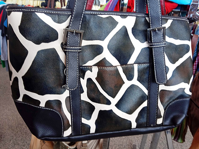 That giraffe-print handbag is either a bold fashion statement or a cry for help – you decide.