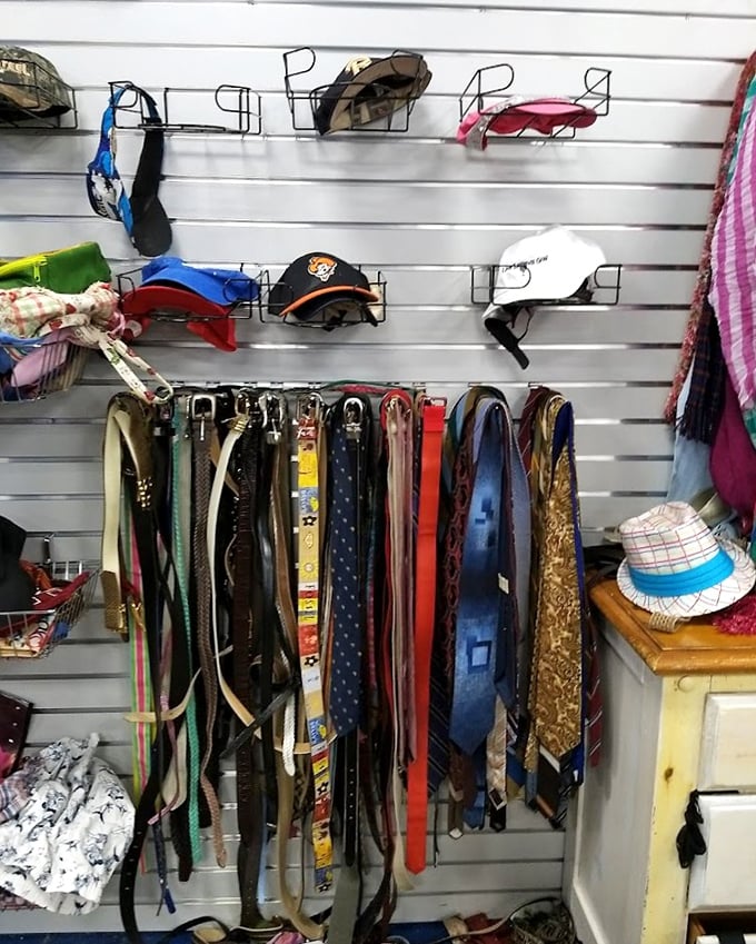 The accessories wall—where forgotten neckties and baseball caps begin their second acts. One person's "meh" is another's "magnificent!"