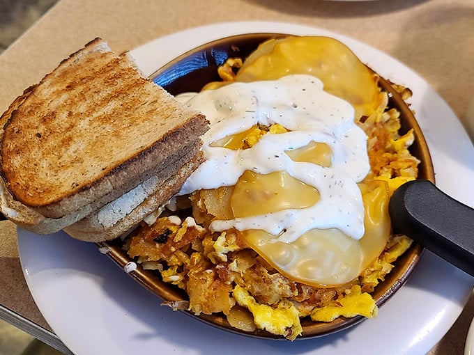 The breakfast skillet that launched a thousand food dreams—home fries mingling with eggs and cheese in a symphony of morning deliciousness.