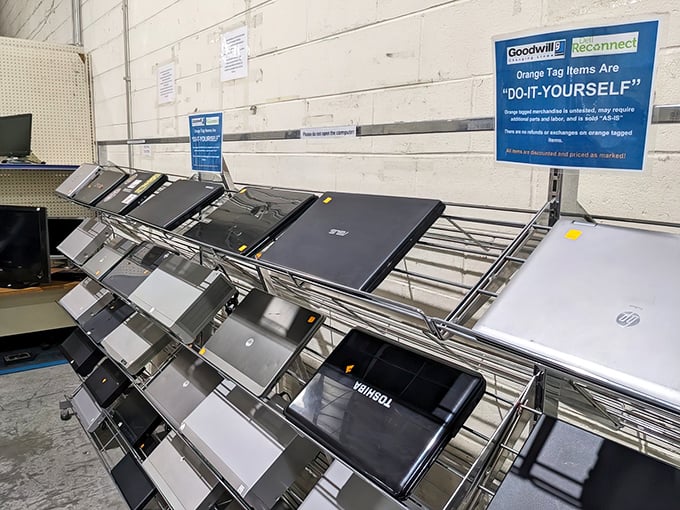 Laptop row – where yesterday's technology gets a tomorrow, with orange "DIY" tags indicating these digital devices are ready for their comeback story.