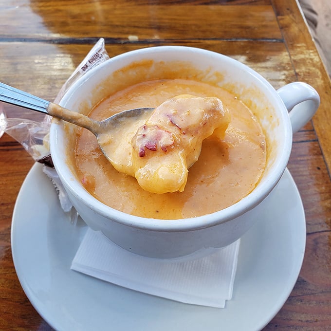 This lobster bisque isn't just soup – it's a warm, creamy hug in a bowl that makes you understand why New Englanders endure those winters.