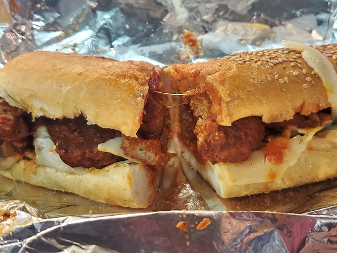 These meatballs aren't just sitting in that roll—they're holding court, demanding respect with every saucy, savory bite.