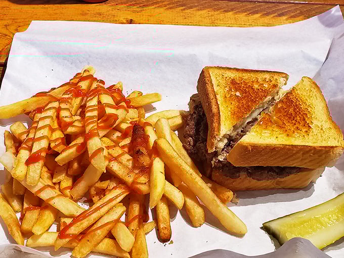 The humble patty melt, elevated to art form. Those golden-brown edges aren't just a color—they're a promise of buttery, crispy perfection.