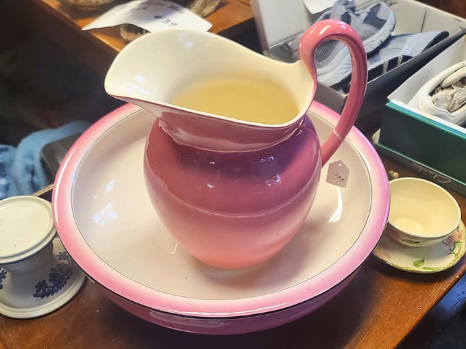 This pink pitcher isn't just kitchenware—it's a splash of 1950s optimism ready to pour joy into your modern home.