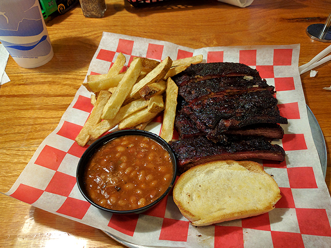 Ribs, beans, and fries – the barbecue equivalent of a Grammy-winning supergroup. Each component a star, but together, they're legendary.