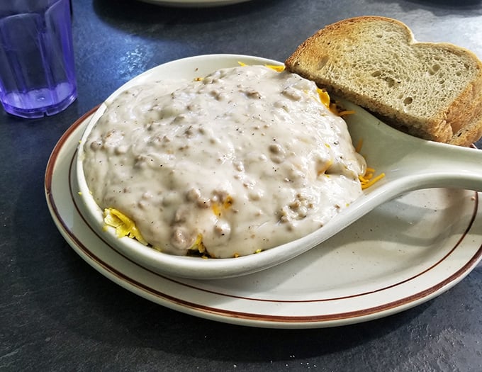 The star of the show—sausage gravy with the perfect pepper-to-cream ratio. This isn't just breakfast; it's an edible hug.