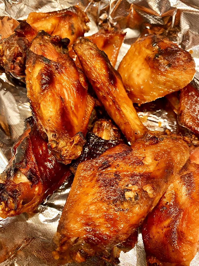 These wings aren't just smoked, they're given a flavor spa treatment. Glistening with sauce and beckoning you to abandon all table manners.