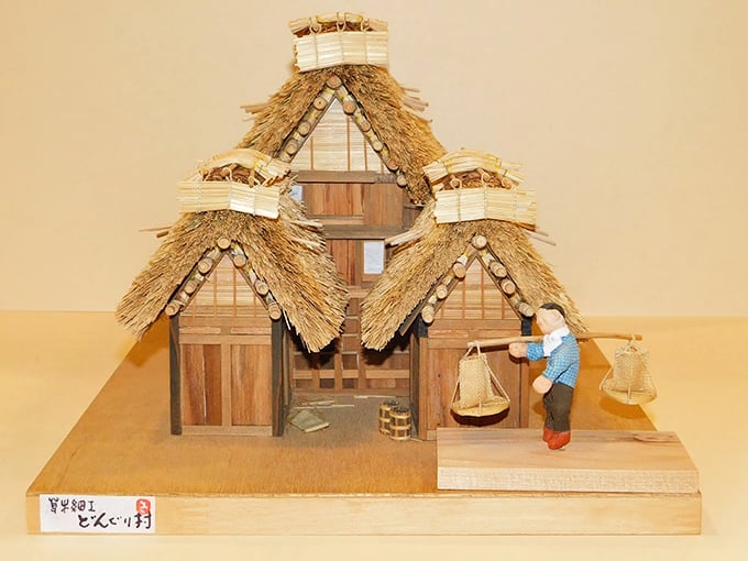 This traditional Japanese-style miniature dwelling features hand-crafted thatching so realistic you can almost smell the straw in the summer heat.