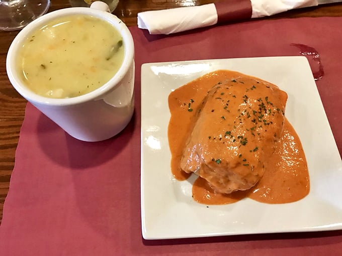 That stuffed cabbage isn't just dinner—it's a hug on a plate. The vibrant sauce practically sings with tangy, savory notes that dance on your palate.