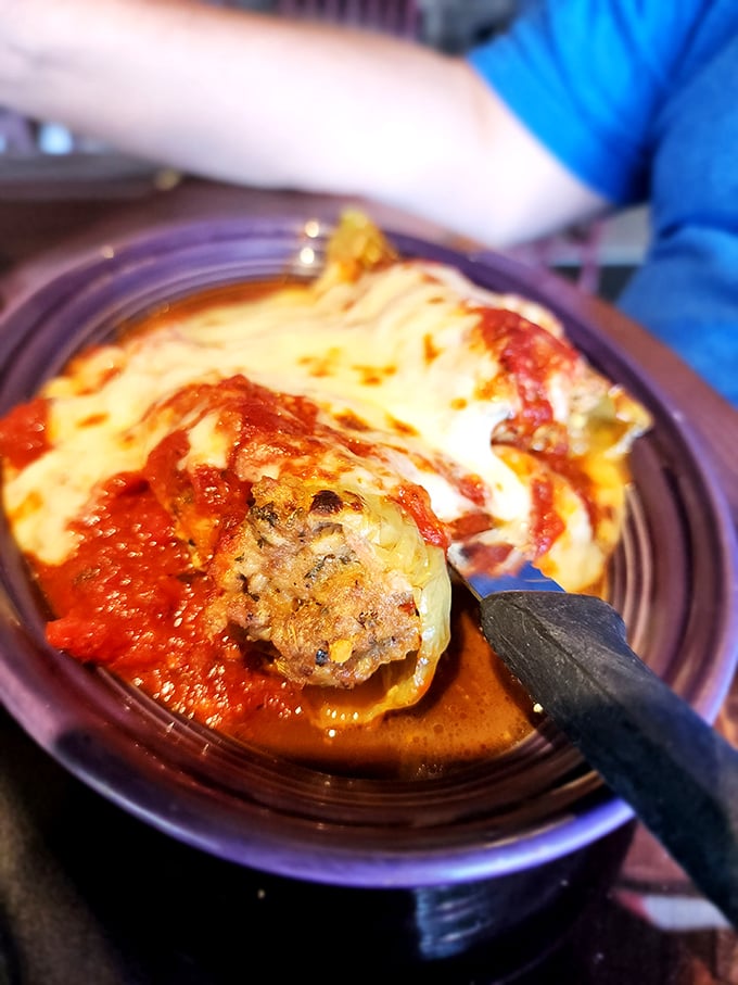 These stuffed peppers aren't just a meal – they're an edible love story between vegetables and cheese, with marinara as the matchmaker.