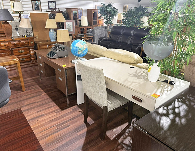 Mid-century desks that have probably seen more homework than most teachers. That globe is calling all armchair travelers.