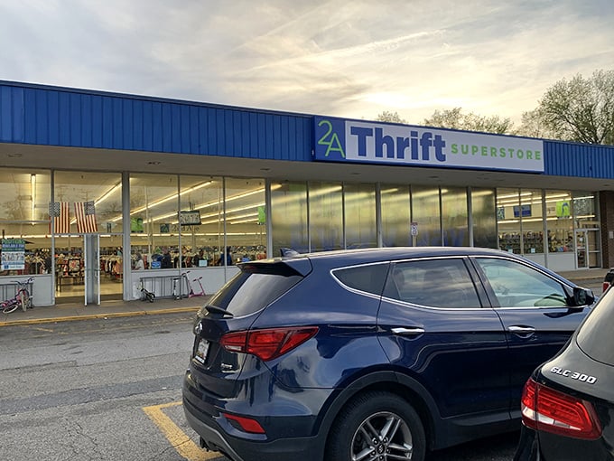 Baltimore's 2nd Ave Thrift Superstore's blue signage pops against the sky—as vibrant as the finds inside.