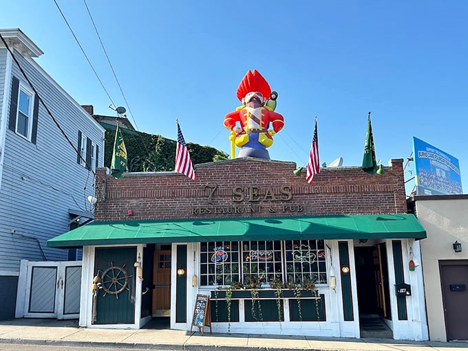 That lobsterman statue isn't just quirky decor—it's a beacon guiding hungry travelers to seafood salvation.