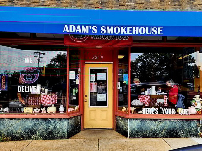 Adam's Smokehouse's cheerful red-and-blue exterior feels like barbecue's happy place, where smoke dreams come true.