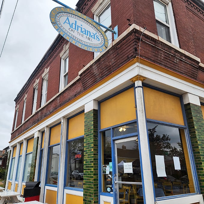 Yellow and blue paint job announces "creative souls work here" louder than any advertising campaign.