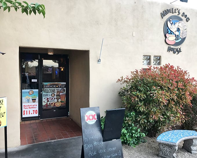 That modest entrance with the chalkboard sign has "neighborhood secret" written all over it in the best possible way.