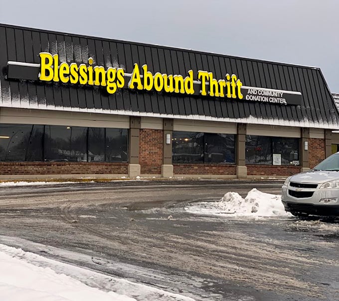 Blessings Abound indeed! That cheerful yellow sign brightens even snowy days for dedicated thrift hunters.