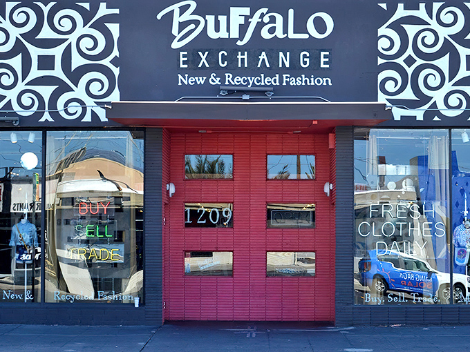 Buffalo Exchange's bold storefront pops with personality. That red door isn't just an entrance—it's a portal to fashion adventures.