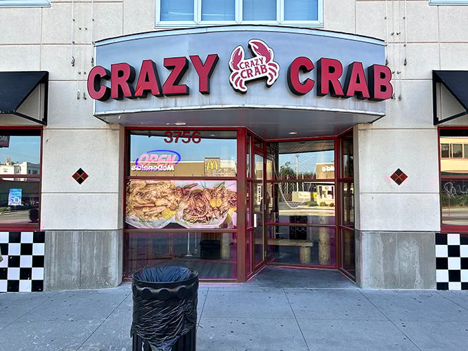 Crazy Crab's bold signage and checkered pattern announce serious seafood business with a side of playful, old-school diner charm.