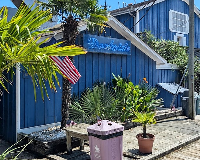 Dockside's brilliant blue exterior matches the water it sits beside – a colorful promise of seafood with a view.
