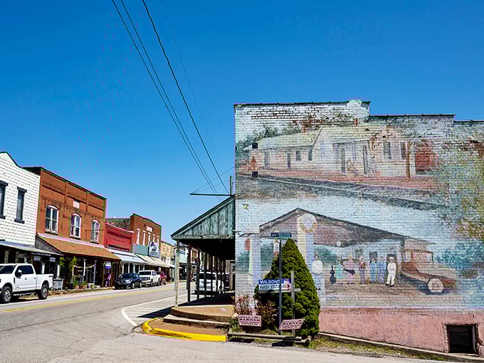 A colorful mural celebrates Hardy's railroad heritage on the side of a historic building. Small towns tell their stories in big ways!