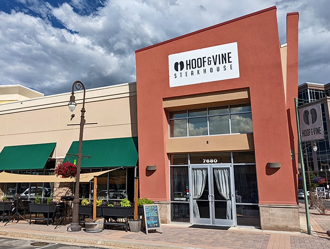 Hoof & Vine's coral-colored exterior pops against the blue sky. Like a sunset you can eat at.