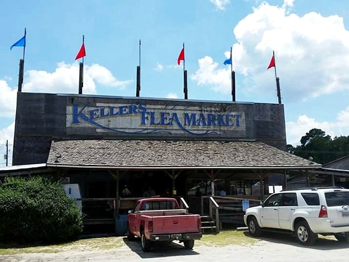 Keller's rustic wooden entrance with colorful flags gives the first hint of adventures waiting inside.