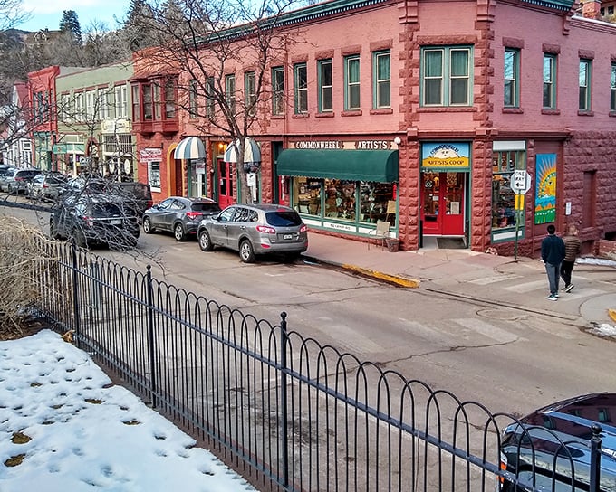 Even in winter’s chill, Manitou Springs’ vibrant storefronts glow with mountain-town charm.