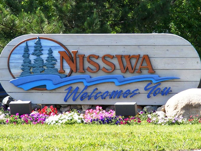 Nisswa welcomes you with the kind of sign that promises lake memories and summer magic.