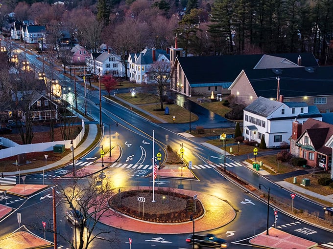 The evening glow illuminates Rochester's roundabout, where traffic flows freely and so do the savings at local establishments. 