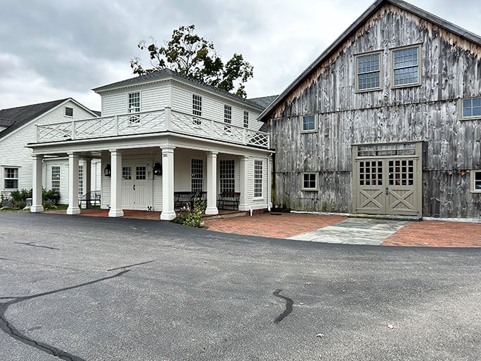 Salem Cross Inn combines colonial charm with culinary excellence—white clapboard, weathered barn, and steaks that would make Paul Revere ride again.