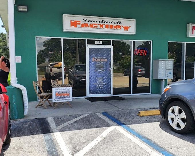 The Sandwich Factory's green storefront promises honest work and honest sandwiches in Lakeland.