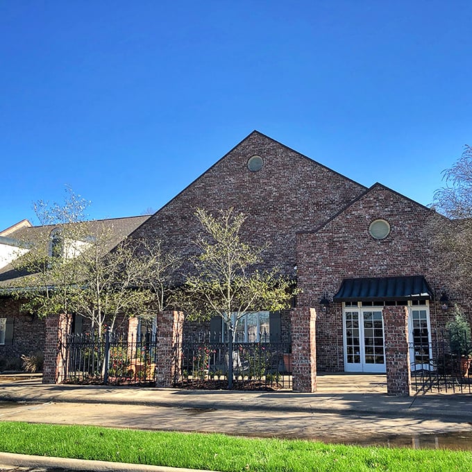 Elegant brick architecture hints at the refined steakhouse experience waiting inside this Ridgeland favorite.