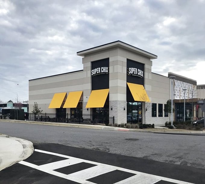 Super Chix's clean lines and bright awnings hint at the premium chicken experience waiting inside this Hoover hotspot.