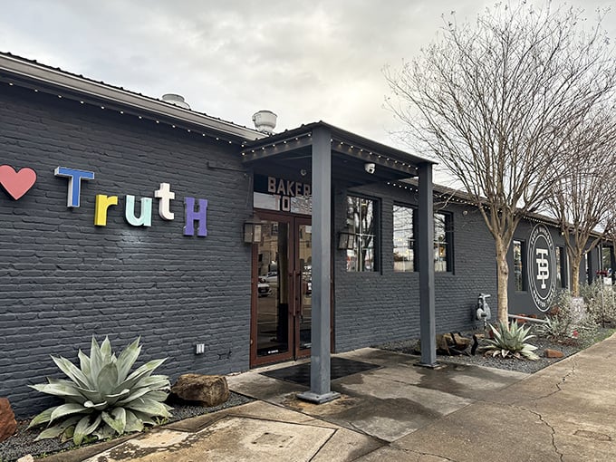Truth BBQ's sleek black exterior hints at the modern magic happening with traditional smoking.