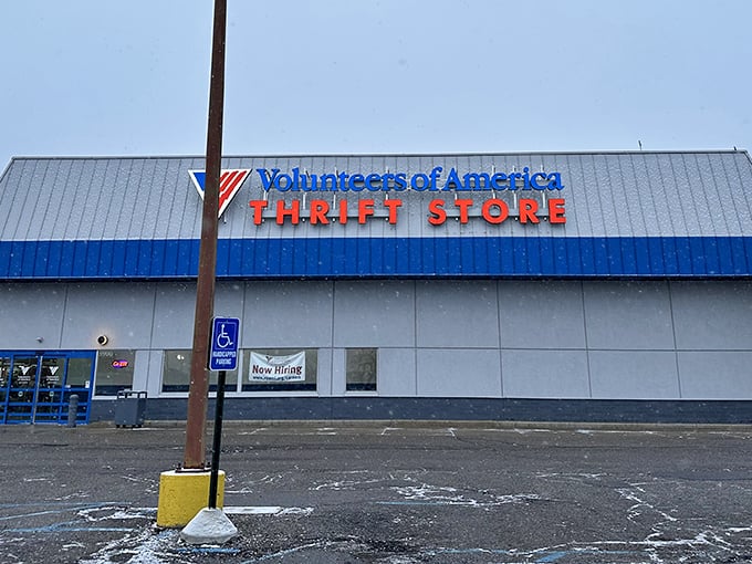 The VOA sign stands tall, beckoning thrift enthusiasts to a building that could house an airplane—or thousands of amazing bargains!