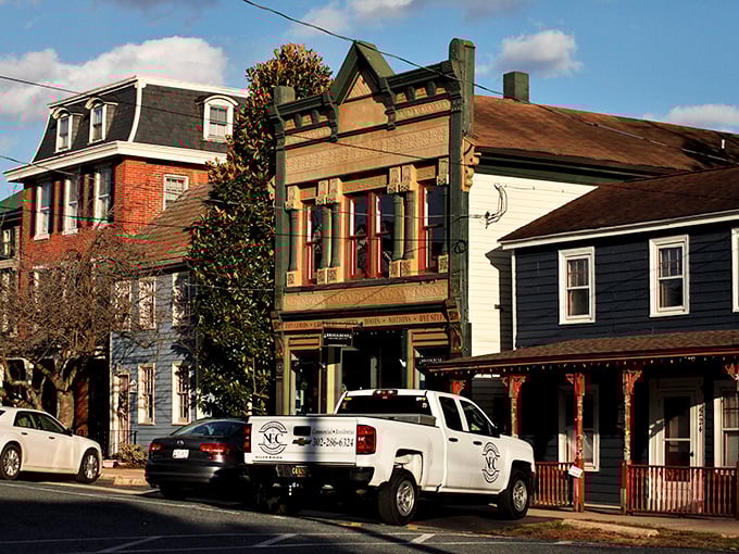 Chesapeake City's colorful Victorian homes line up like well-dressed guests at a waterfront garden party.